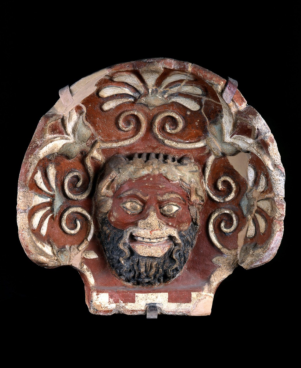 Antefix with the head of a Maenad and Silenus